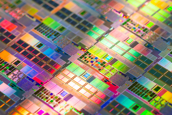 AI Boom Buoys Chip Industry Even as Risks Loom Large - WSJ